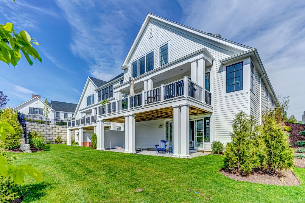 A newly built end unit townhouse with a south-west facing terrace and ...